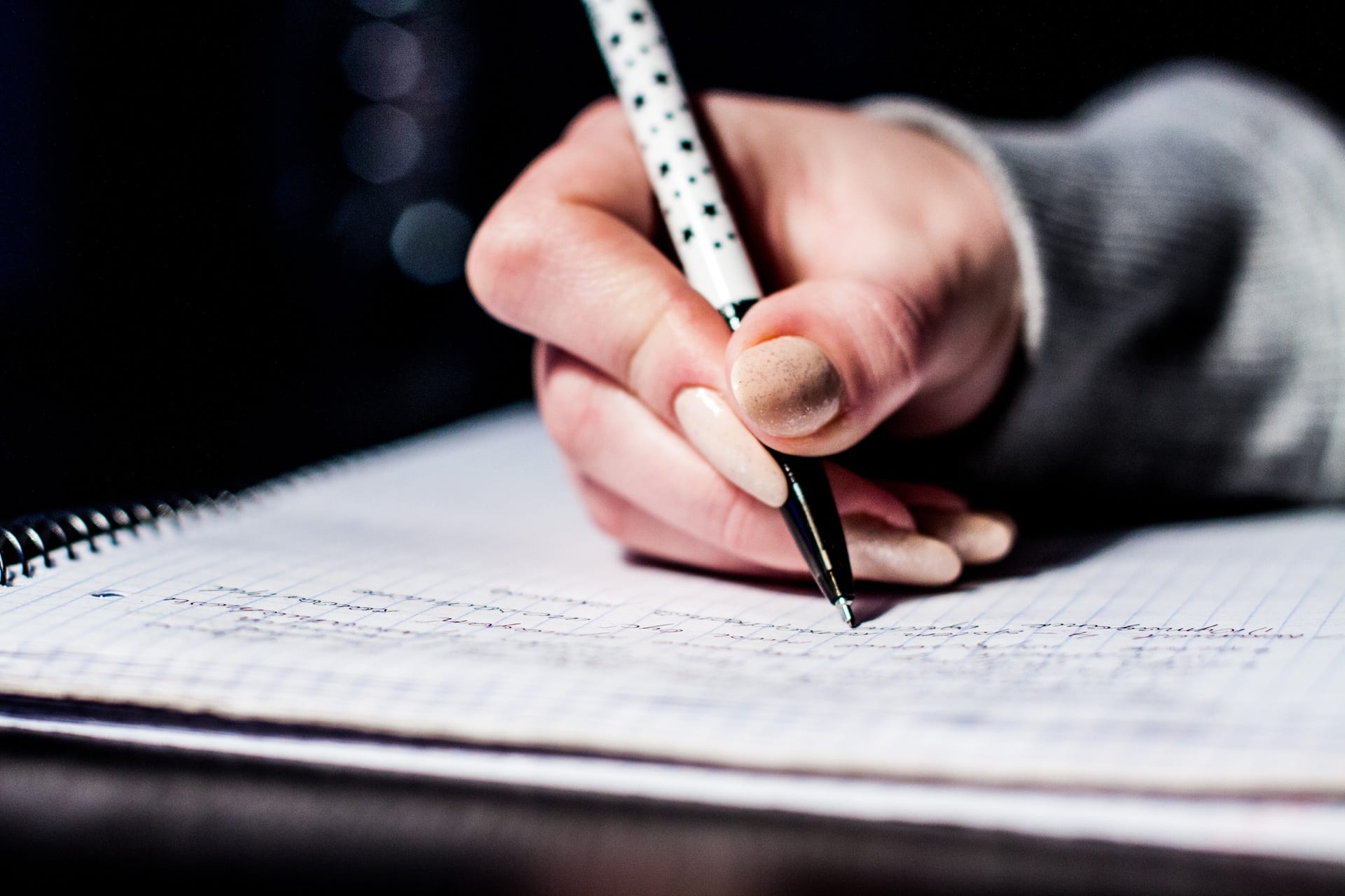Pen writing notes studying The Olson Group